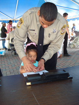 “Child fingerprinting campaign” (TP card preparation of children, for ...